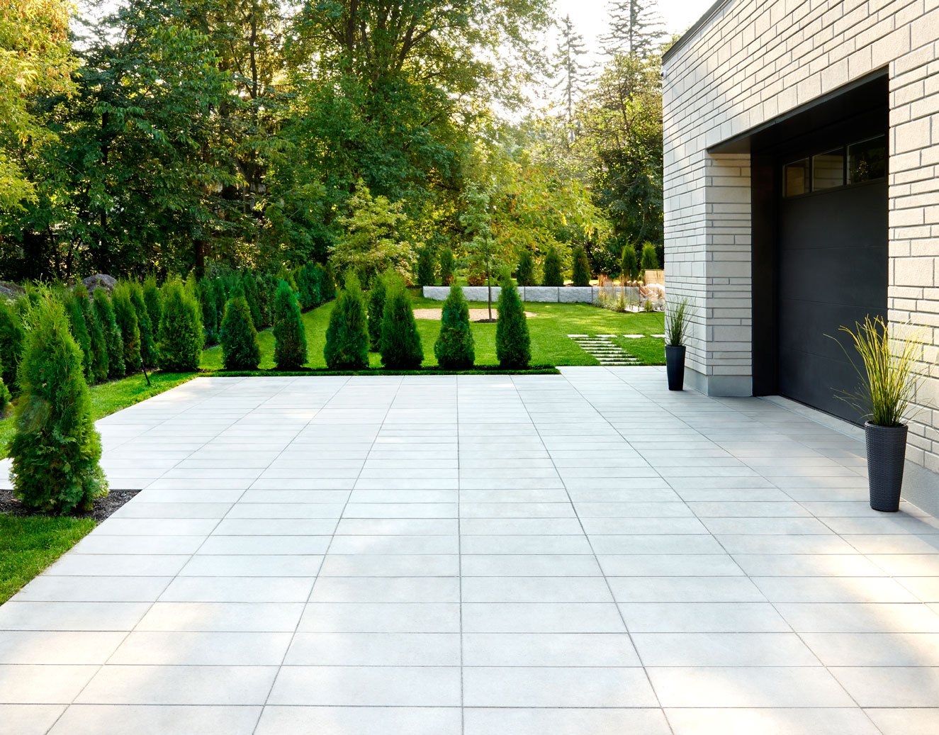 Comment choisir les pavés idéals pour votre entrée